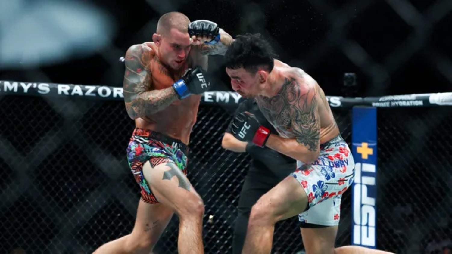 Dustin Poirier And Max Holloway Went To War For Five Rounds At UFC 318